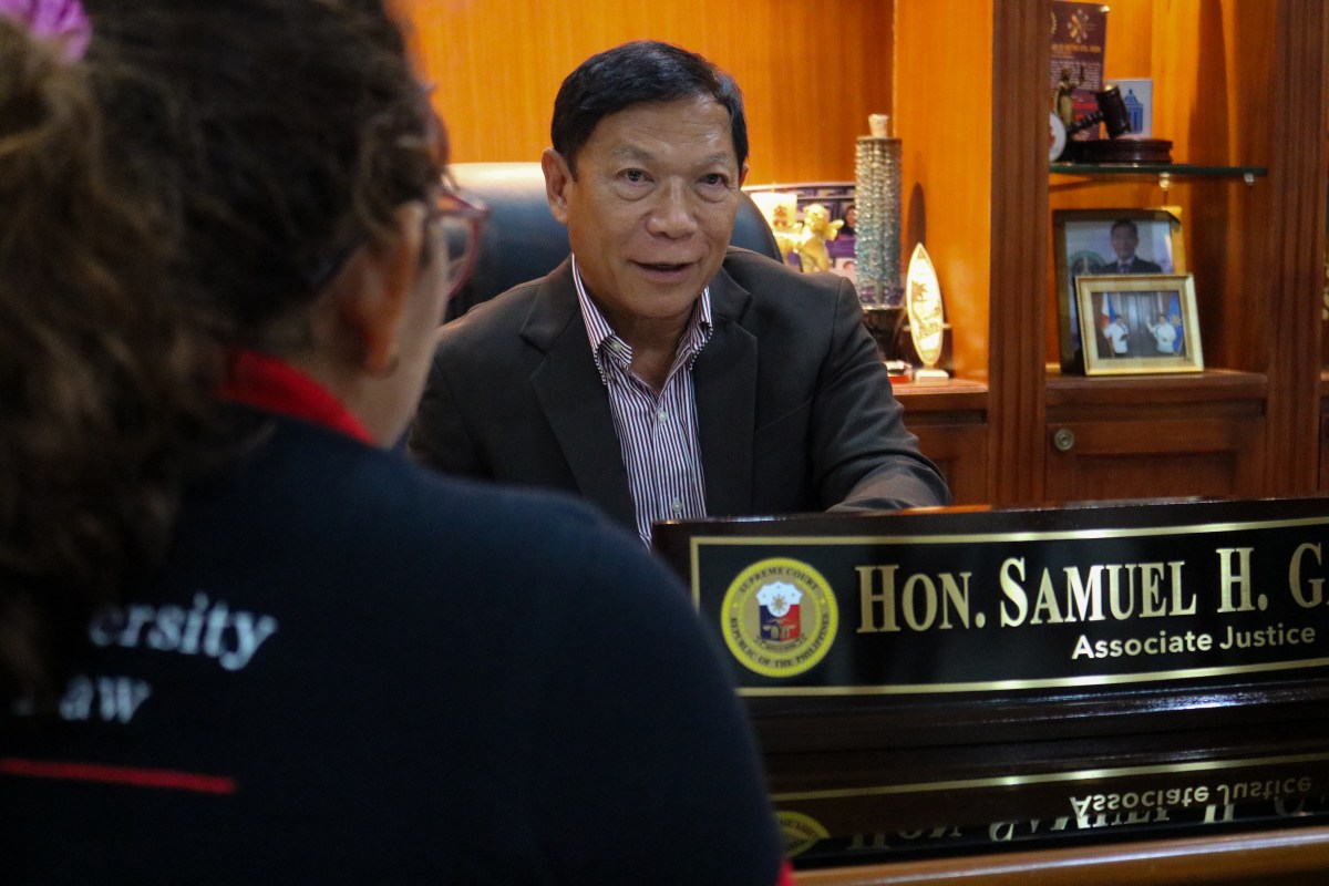 All rise: Justices Ramon Paul Hernando, Mario Lopez, and Samuel Gaerlan ...